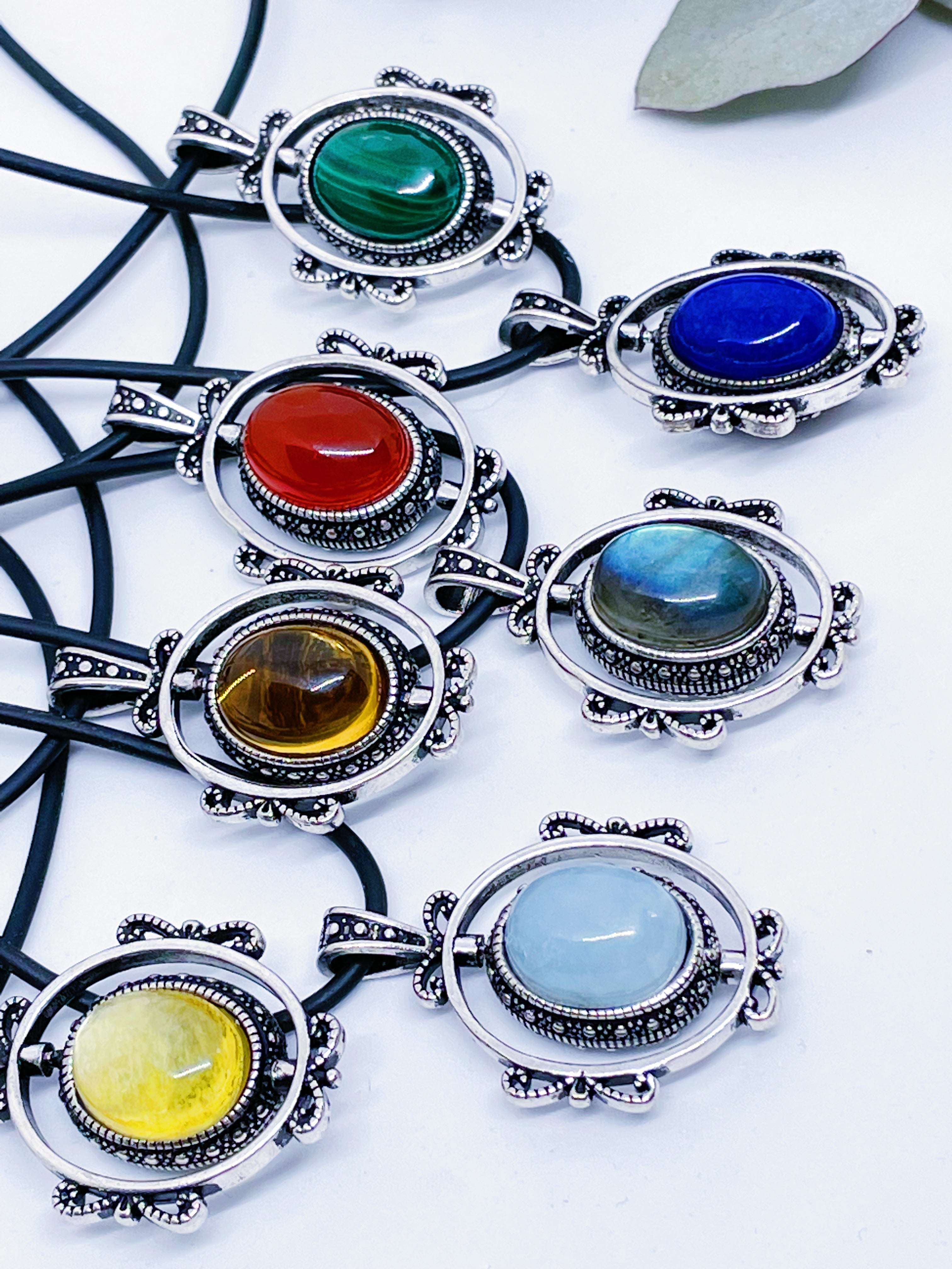 Vintage Spinning Crystal Pendant – Ink Moon